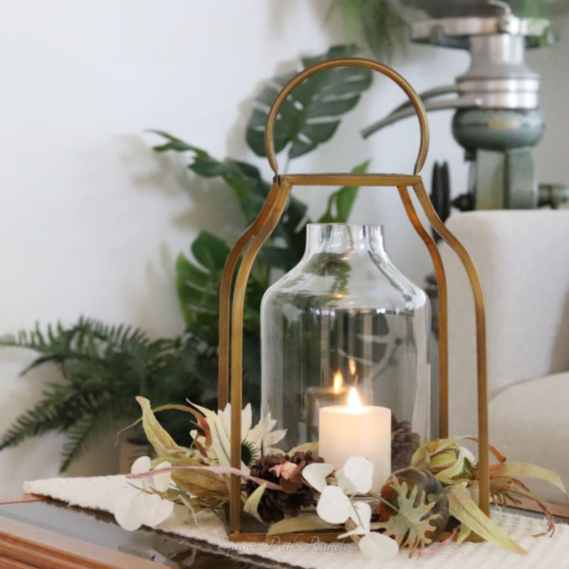 Gold Metal Trapezoid Lantern With Glass Hurricane – Spruce Park Ranch